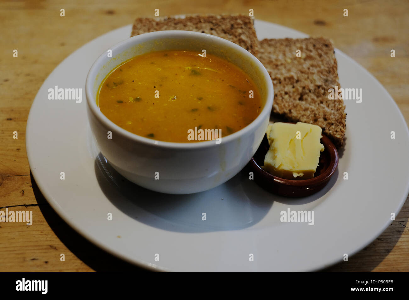 Home made soup, with bread Stock Photo - Alamy