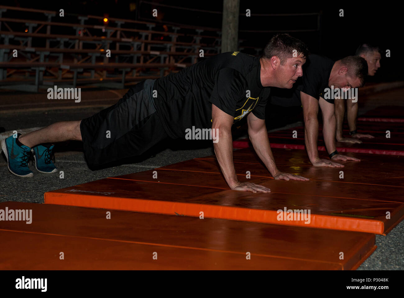 Patrick J. Murphy, Under Secretary of the Army, performs push-ups ...