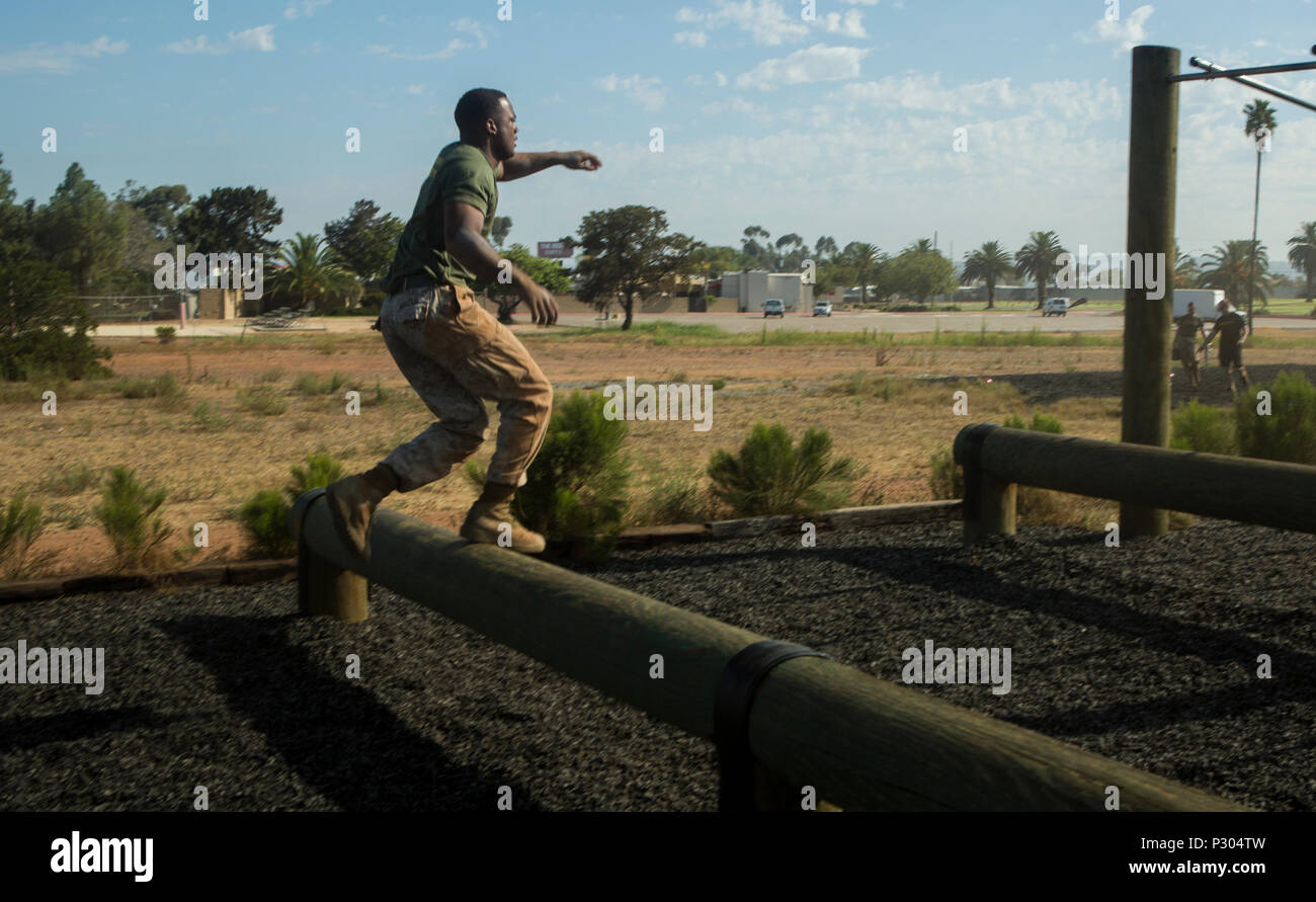 A Marine runs through the obstacle course during the 2nd Annual ...