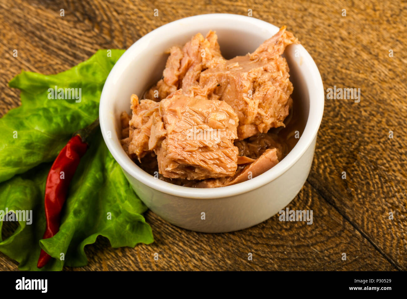 Canned tuna fish in the bowl ready for cooking Stock Photo - Alamy