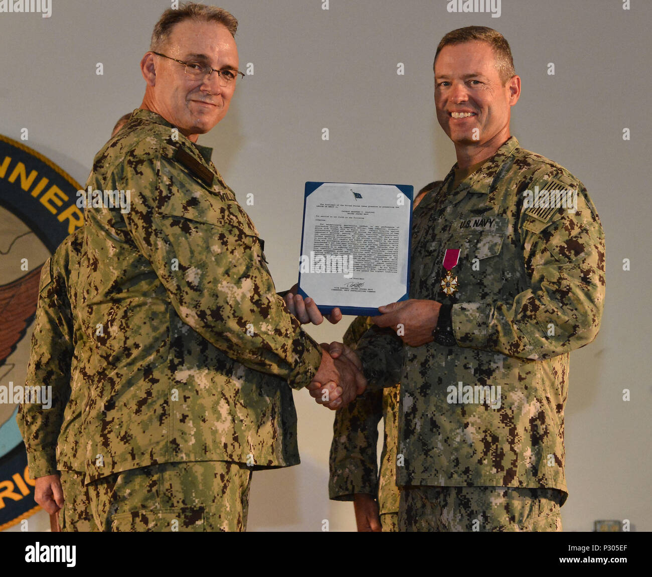 CAMP LEMONNIER, Djibouti - Rear Adm. Rick Williamson, (left) commander ...