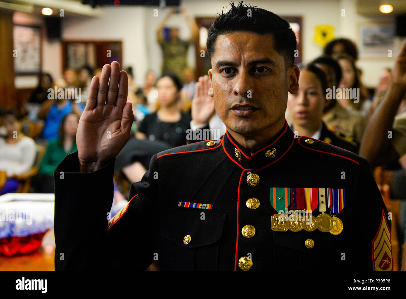 U.S. Marine Corps Staff Sgt. Martin Alonso Balcazar swears the oath of ...