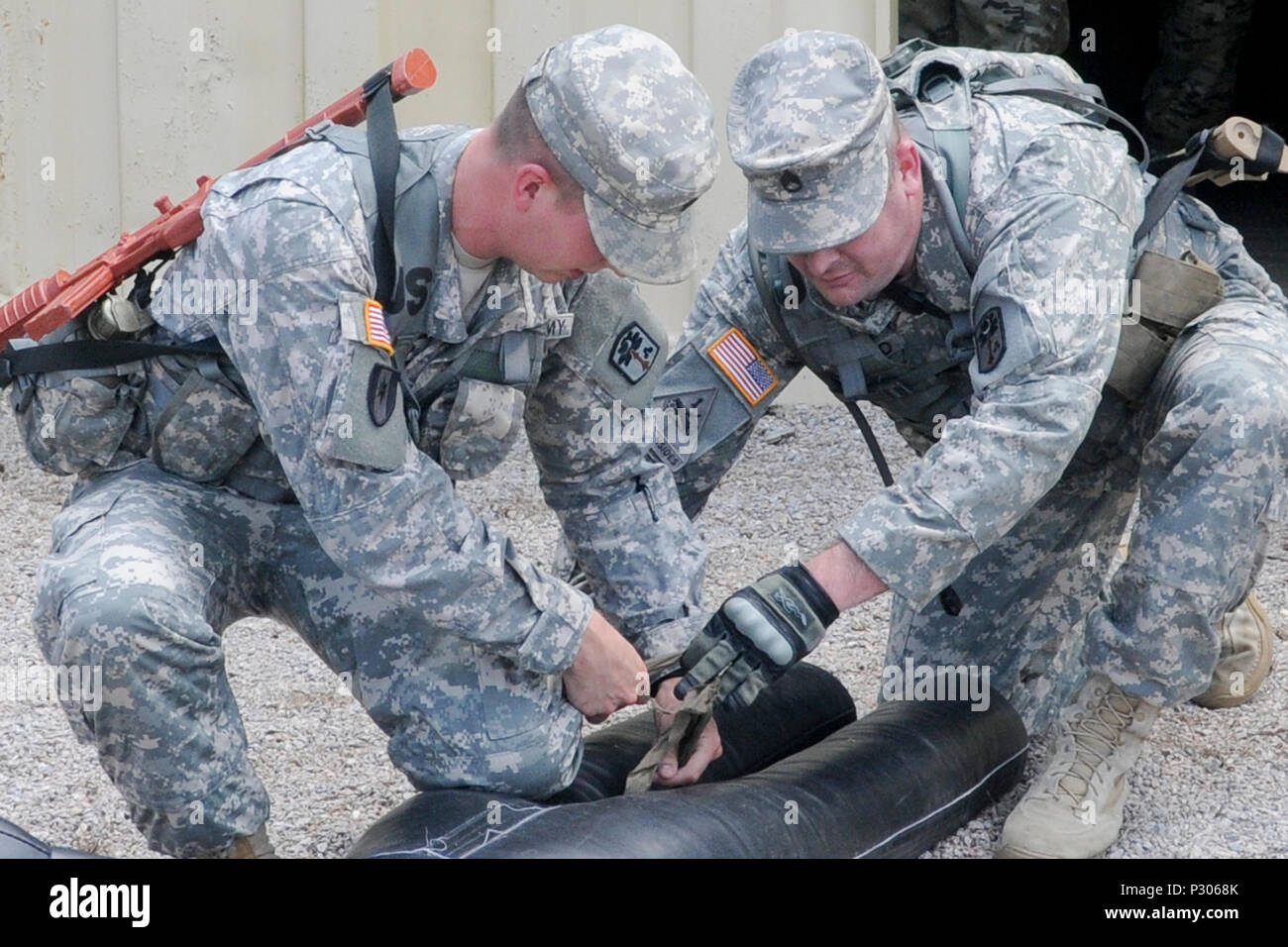 U.S. Army Staff Sgt. James Wingard and Spc. Michael Schaupp from the ...