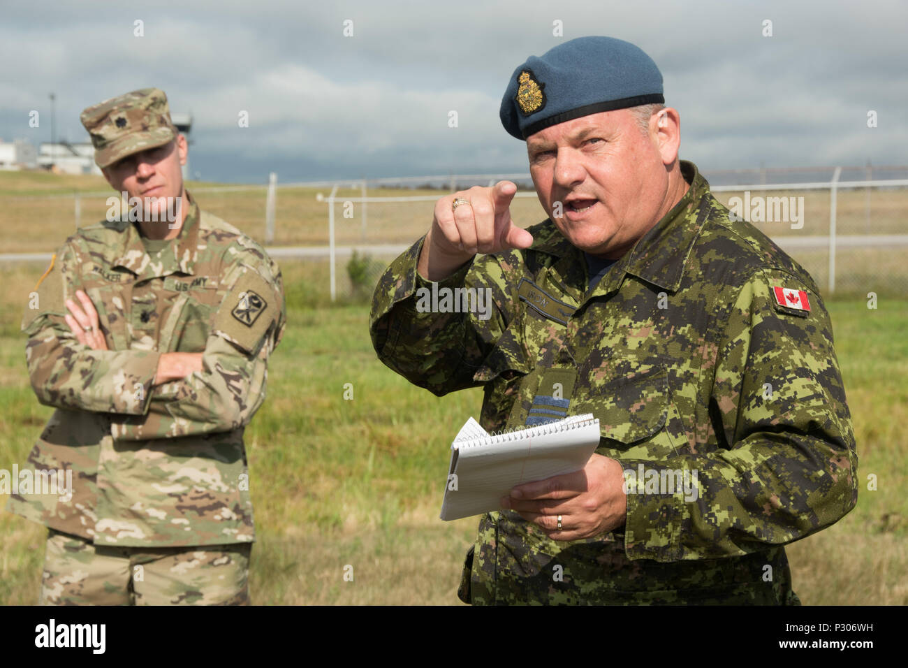 (L-R) Lieutenant-Colonel Steve Walker, Deputy Director Operations and ...