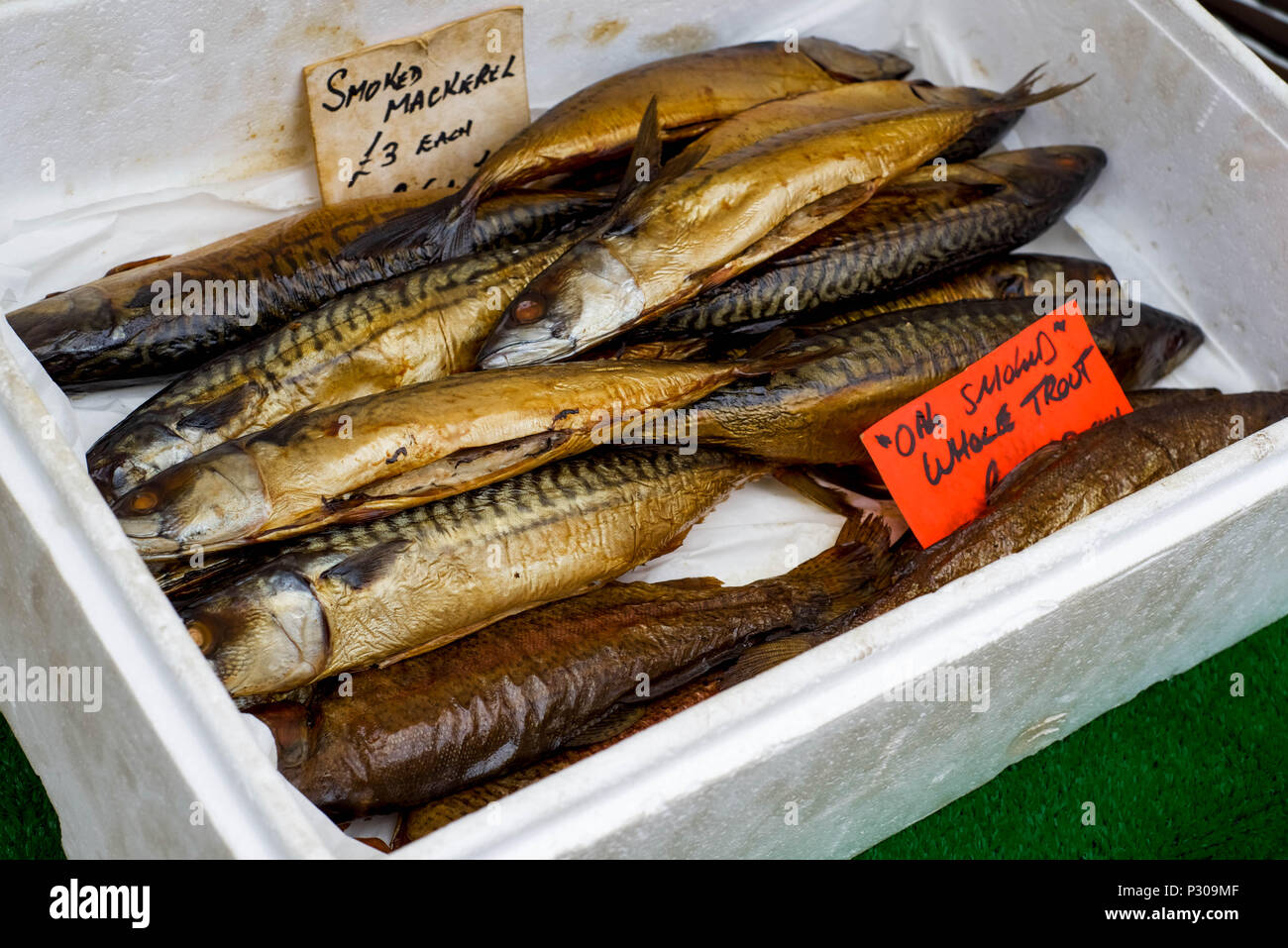 Smoked fish on market stall Stock Photo - Alamy