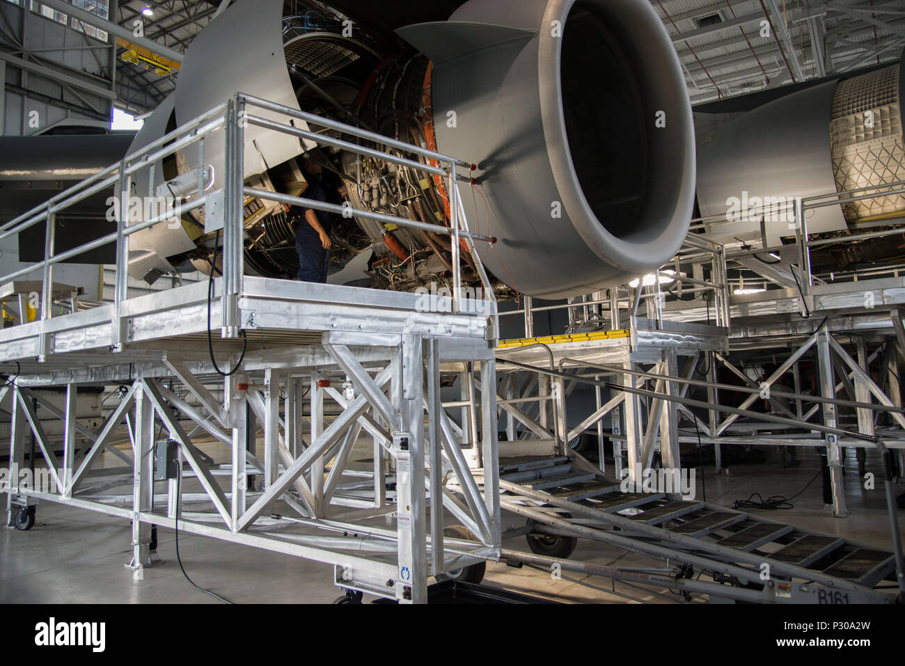 A new C-17 Engine Maintenance Platform surrounds the engines on a C-17A ...