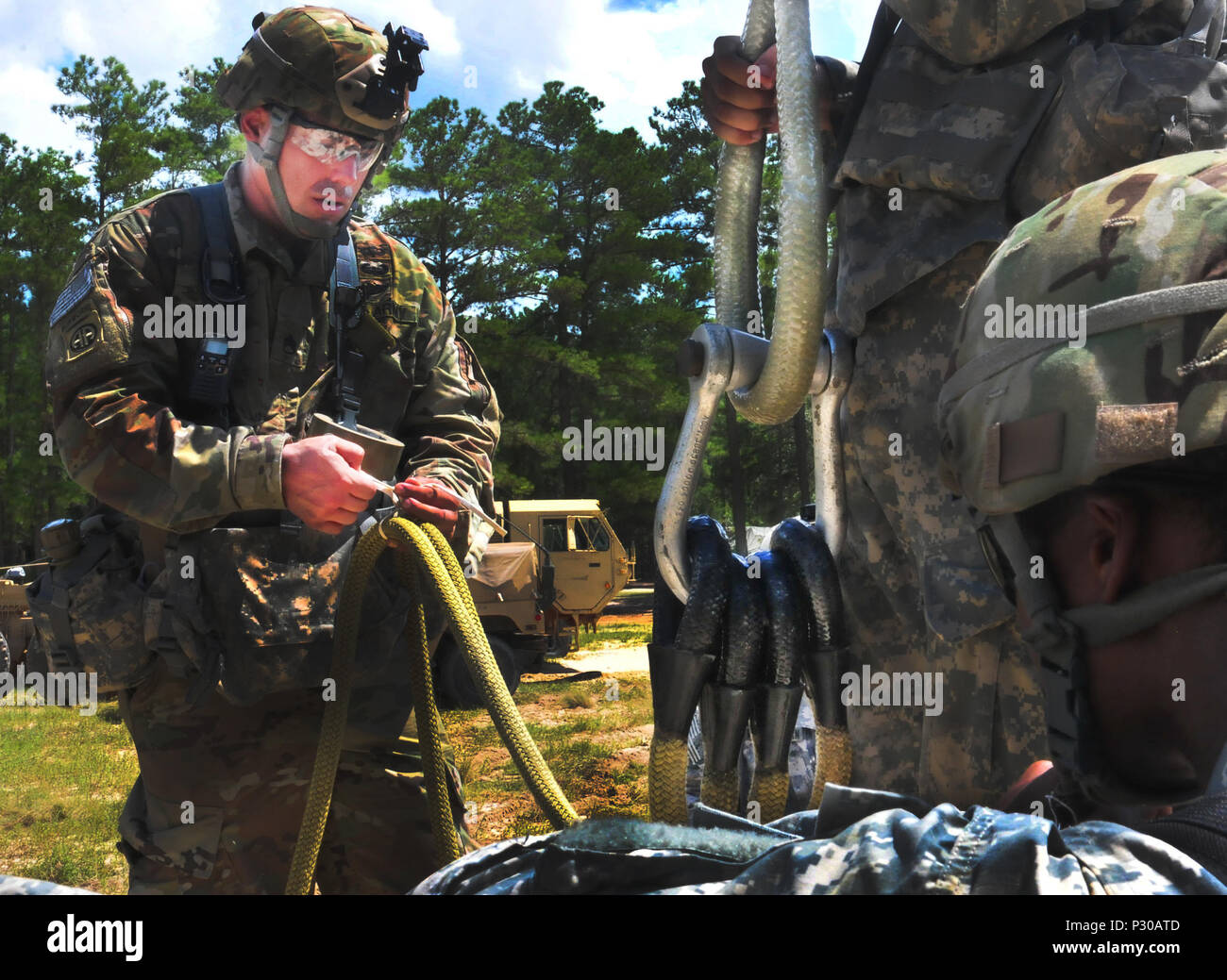 Staff Sgt. Clarence Pino, a squad leader with 407th Brigade Support ...