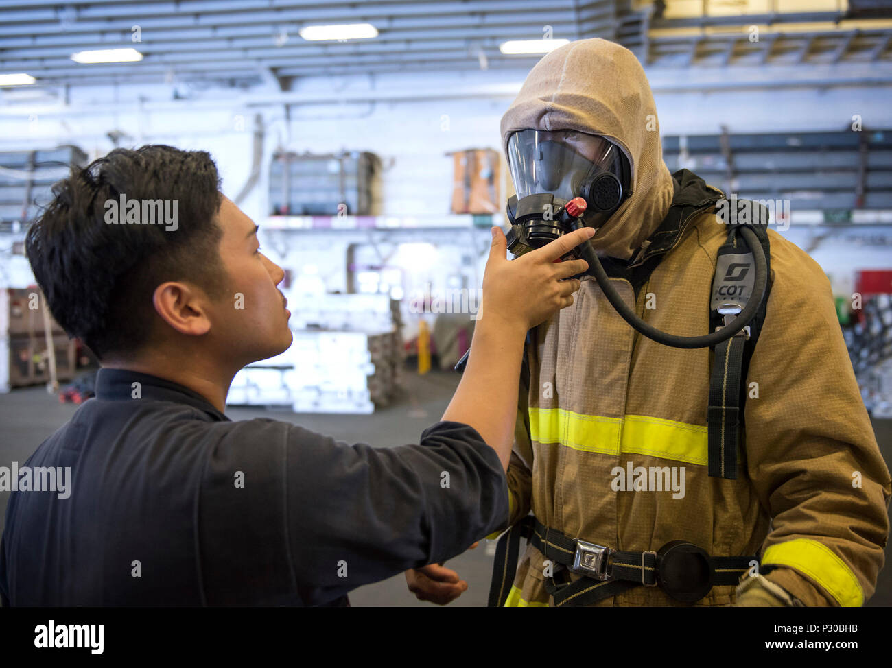 160811-N-WF272-035 EAST CHINA SEA (Aug. 11, 2016) Damage Controlman ...