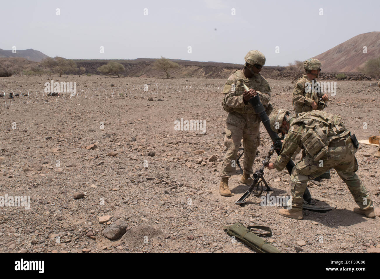 Soldiers assigned to Task Force Hurricane participate in a mortar live ...