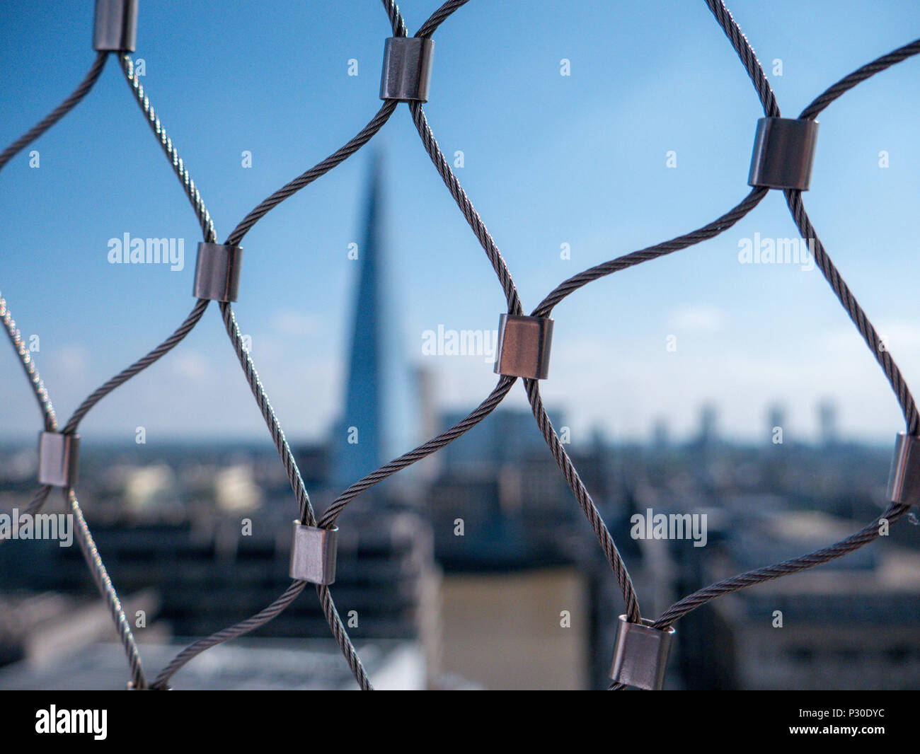 looking through the gate at the shard Stock Photo - Alamy
