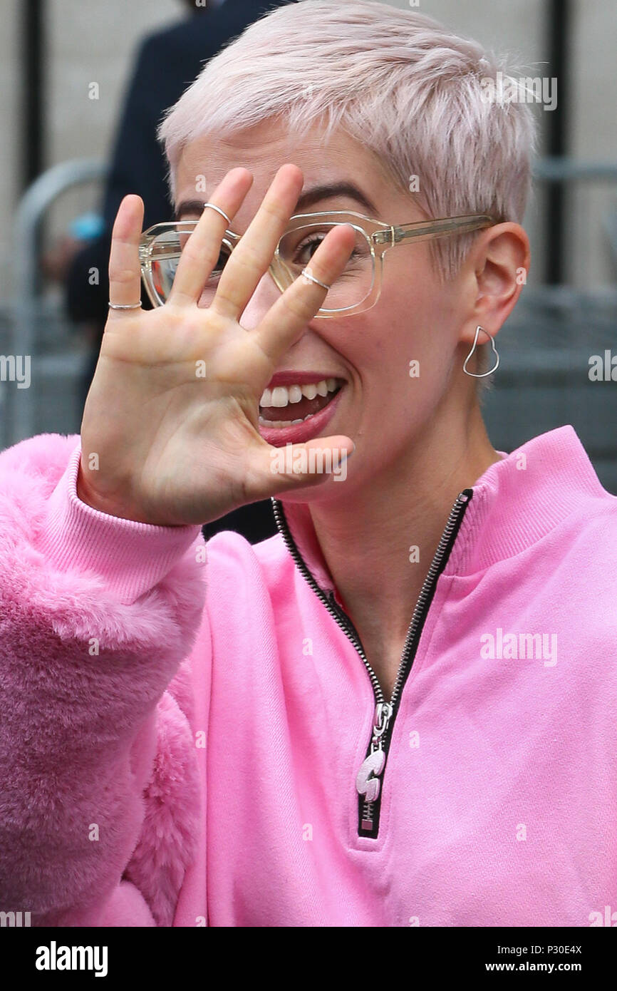 UK Eurovision singer SuRie seen in a bright pink coat as she leaves BBC ...