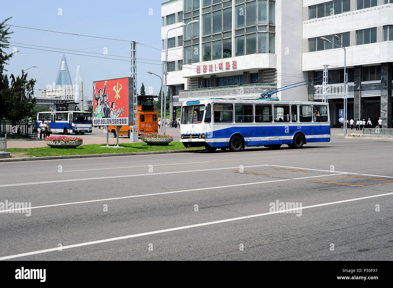 Pyongyang, North Korea, road traffic with buses in the city Stock Photo ...