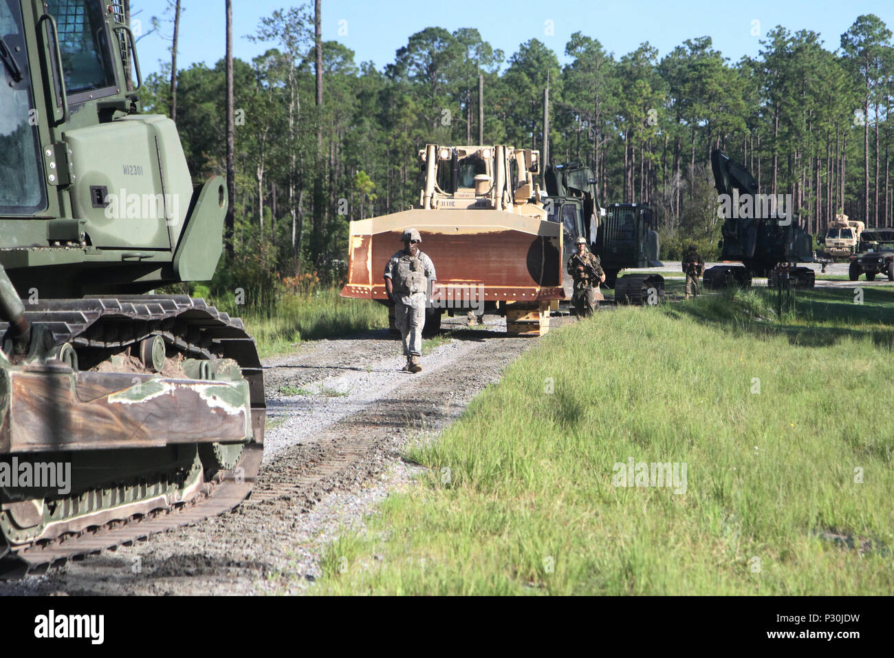 U.S. Army Sgt. Bryan Byrd, a horizontal construction engineer with ...