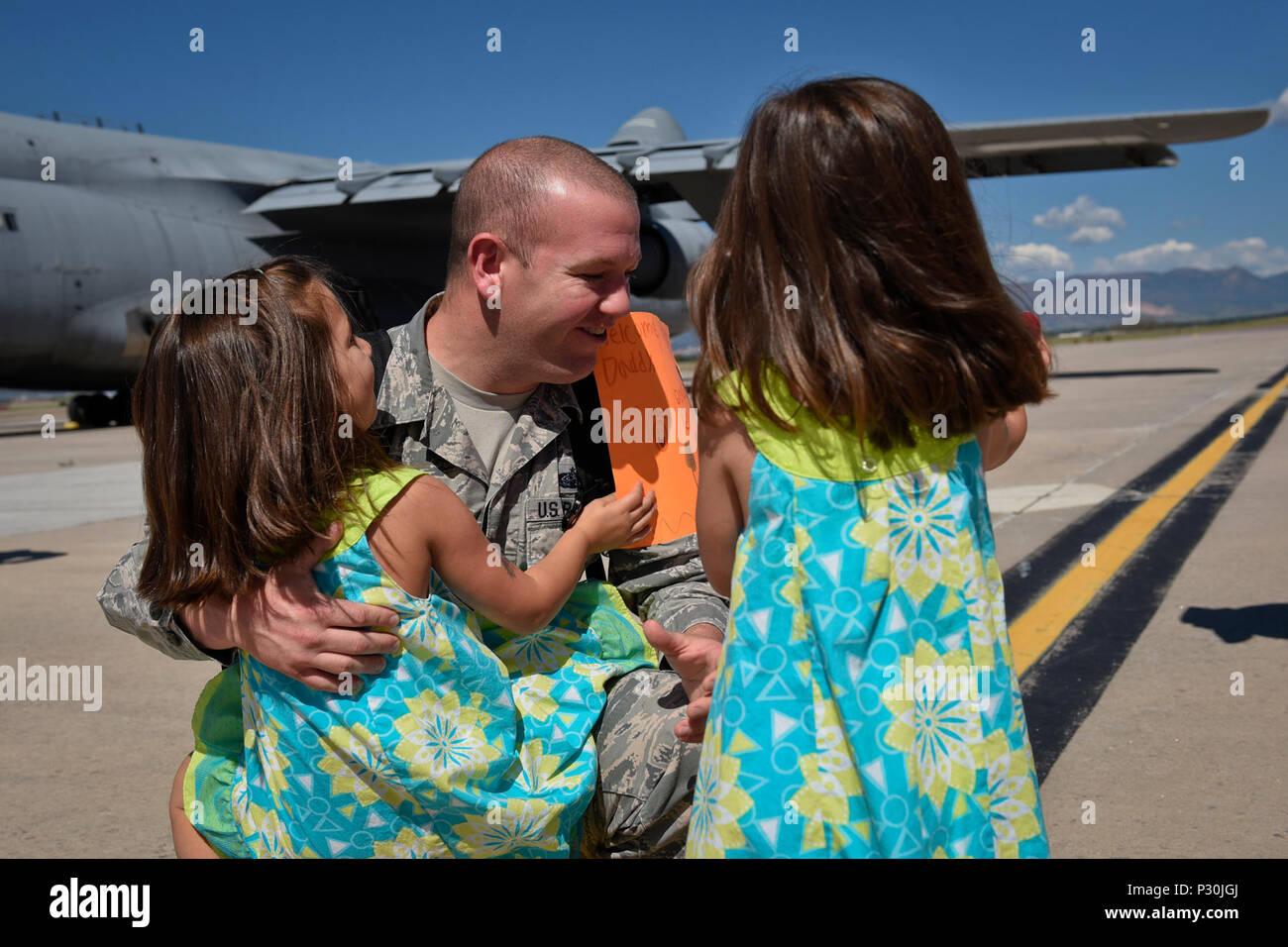 PETERSON AIR FORCE BASE, Colo. - Airmen from the 4th Space Control Squadron greet family members ...