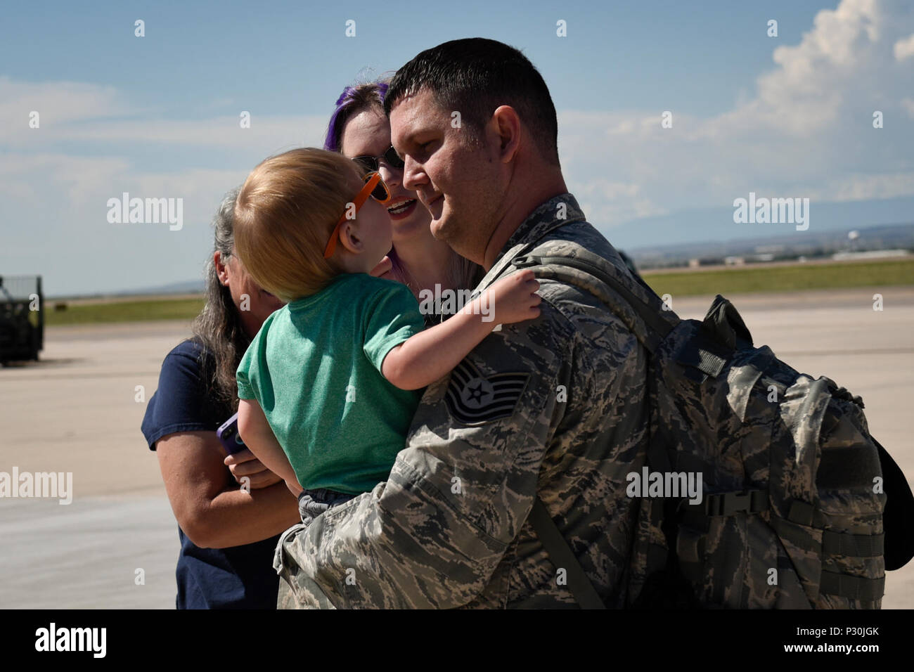 PETERSON AIR FORCE BASE, Colo. - Airmen from the 4th Space Control Squadron greet family members ...