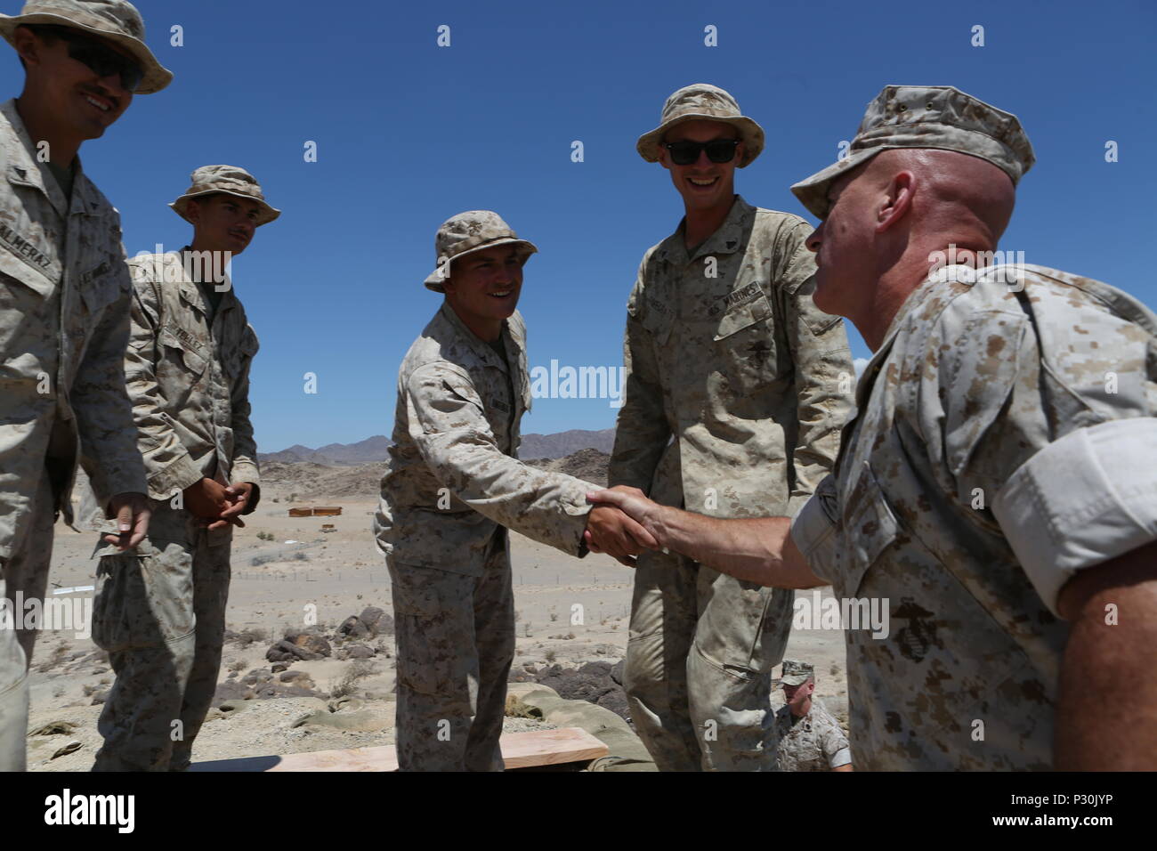 Brigadier General of the 1st Marine Logistics Group speaks with Marines ...