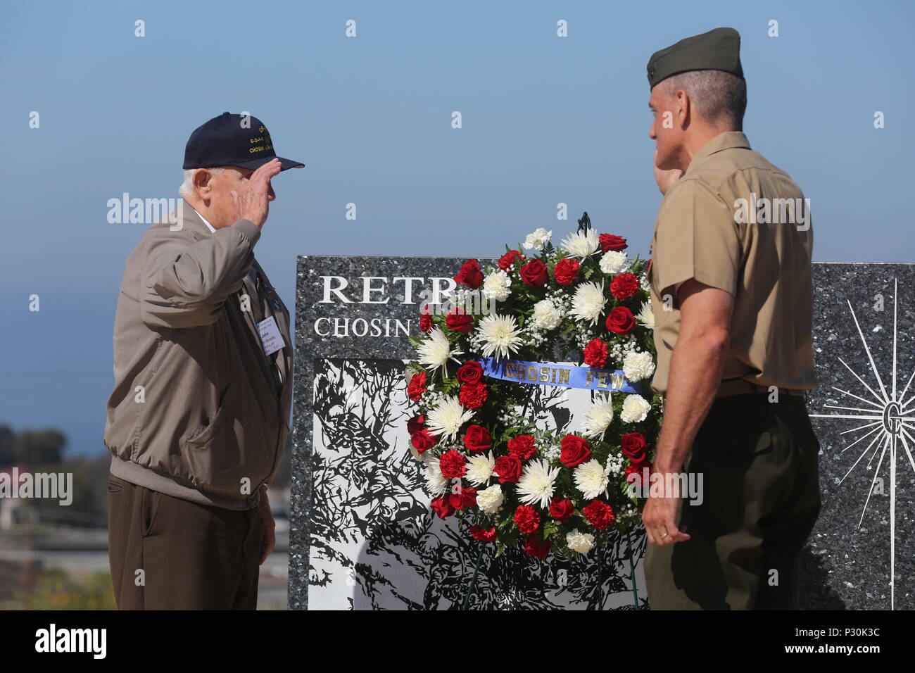 John Beasley, a Korean War veteran, and Maj. Gen. David W. Coffman, the ...