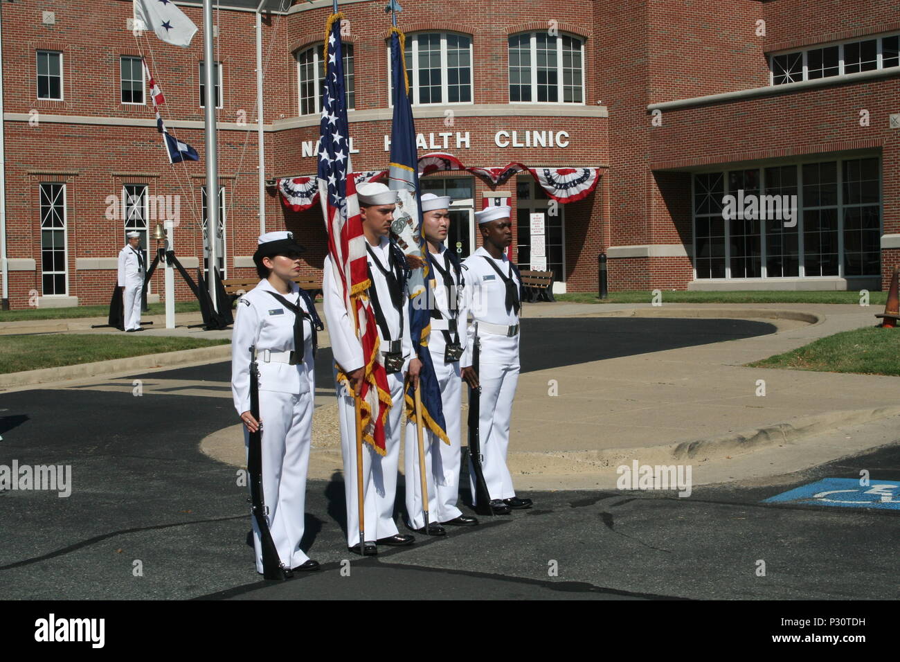 A Navy color guard waits to present the colors at Naval Health Clinic ...