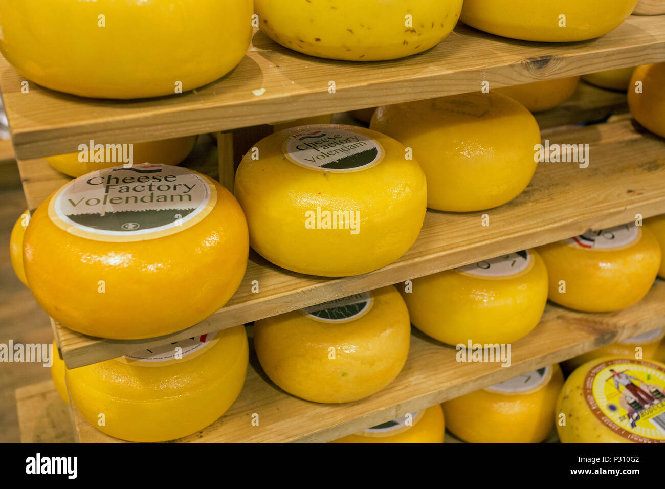 Amsterdam, Netherlands, May 2018, Branded cheeses on display for sale ...