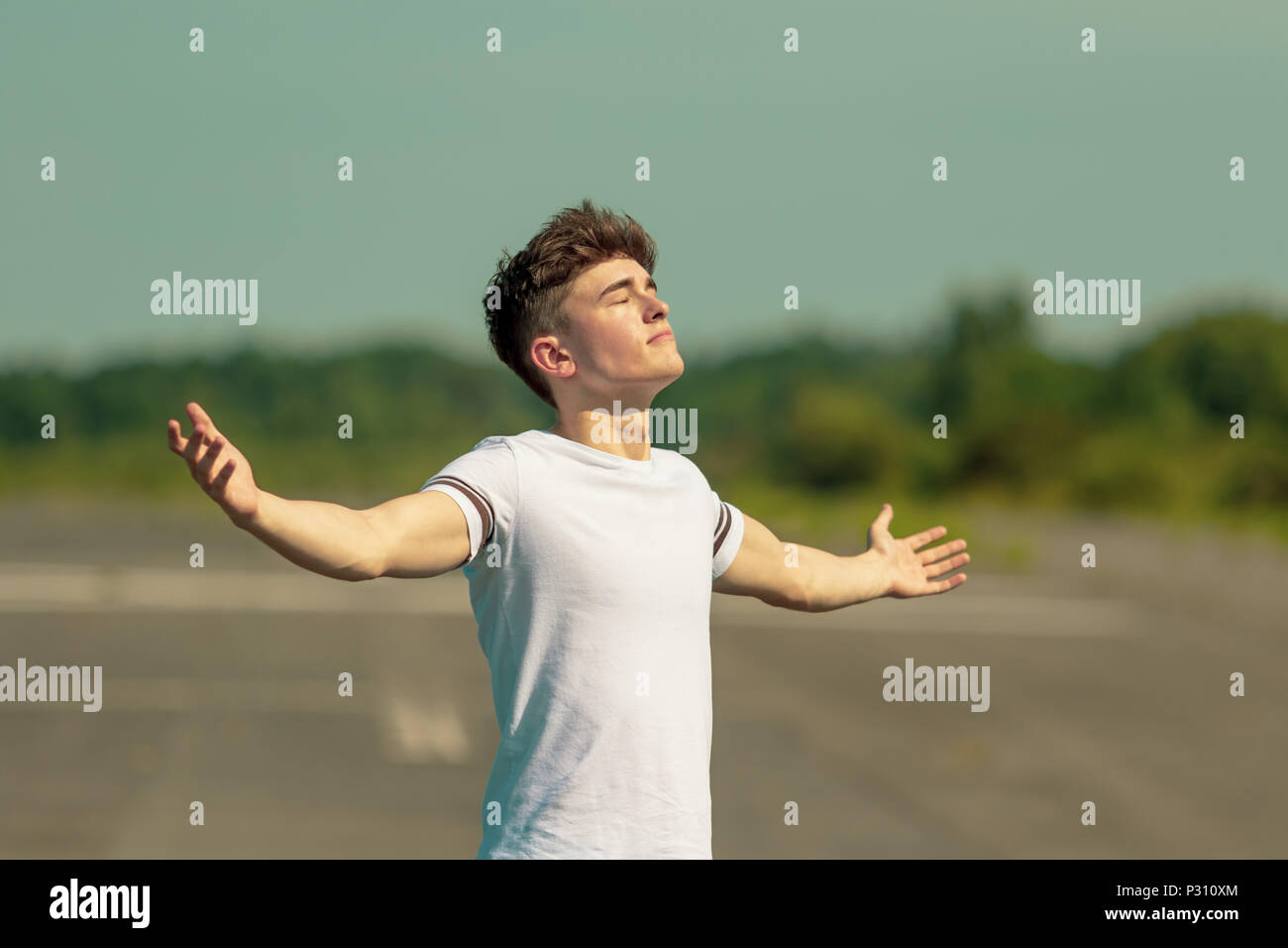 Man enjoying the warm sunshine hi-res stock photography and images - Alamy