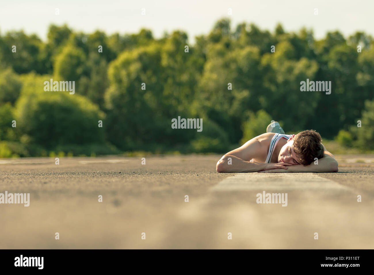 Teenager outside laying hi-res stock photography and images - Alamy