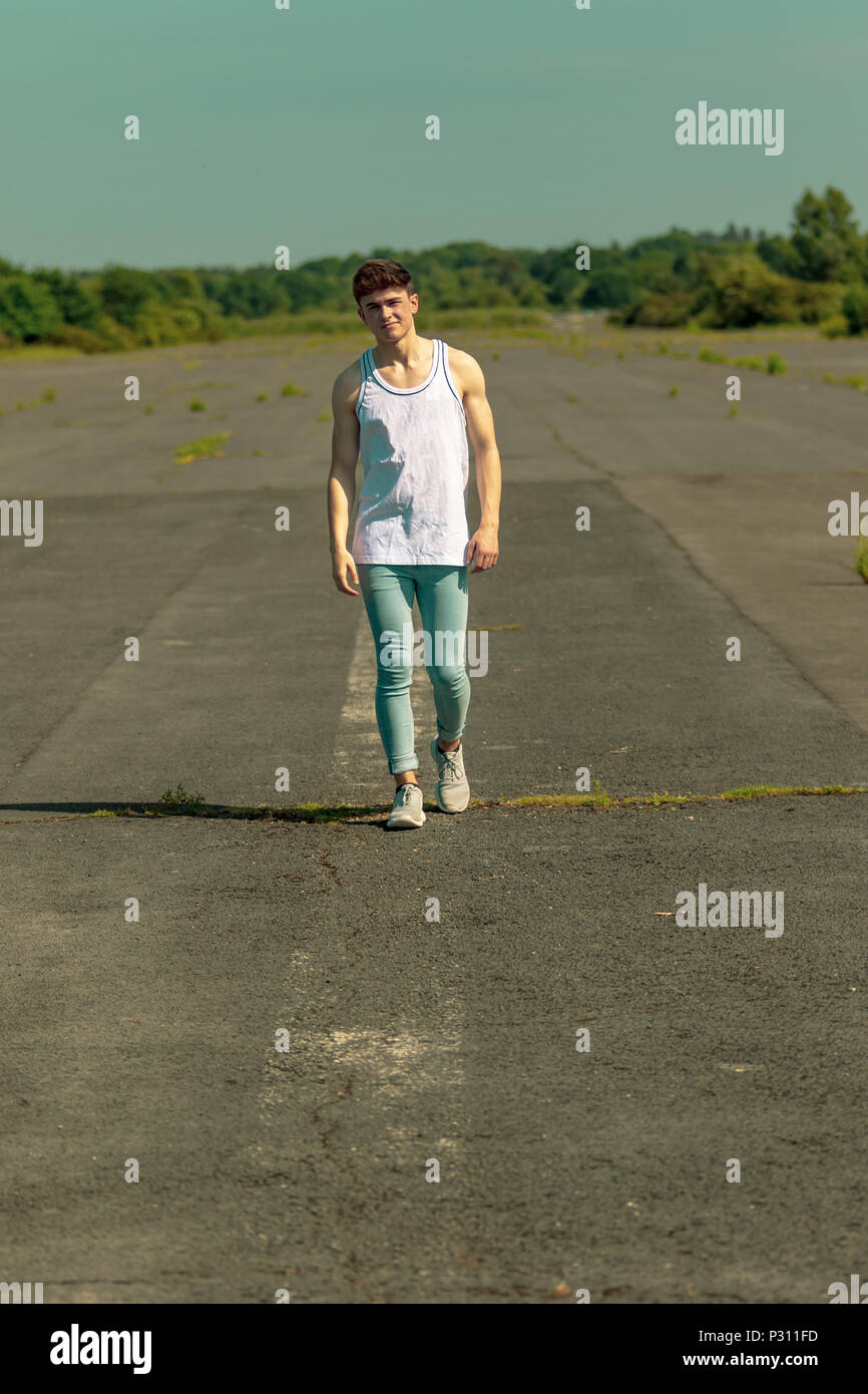 High school boy walking hi-res stock photography and images - Alamy