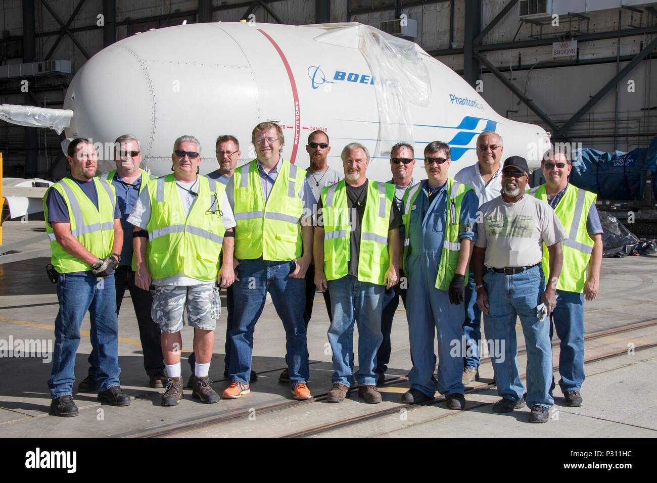 EDWARDS AIR FORCE BASE, Calif. (Aug. 17, 2016) Photos of NASA employees ...