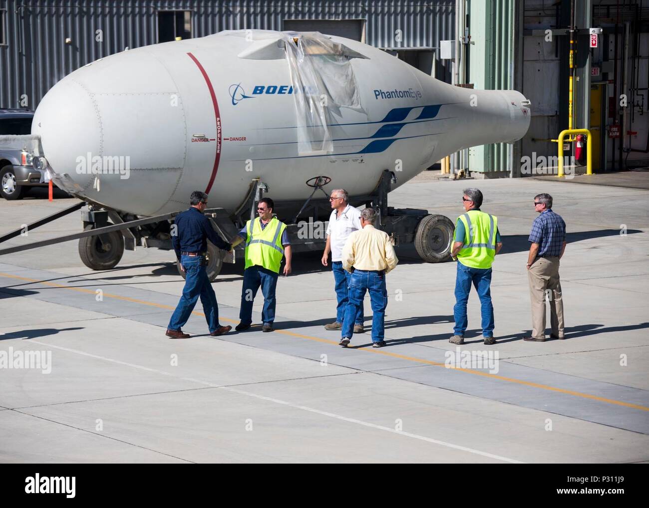 EDWARDS AIR FORCE BASE, Calif. (Aug. 17, 2016) Photos of NASA employees ...