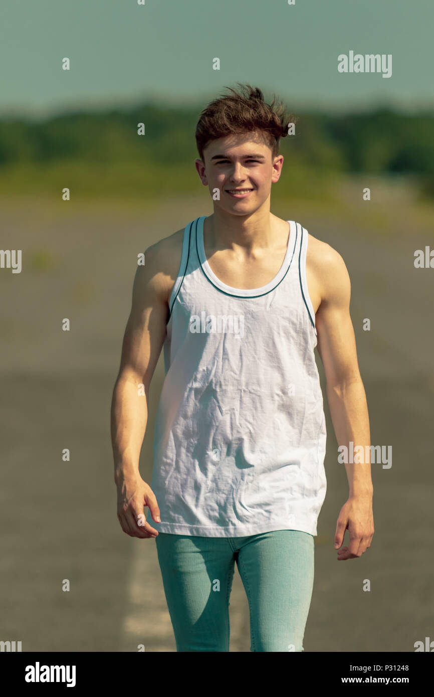 Male high school student walking hi-res stock photography and images ...