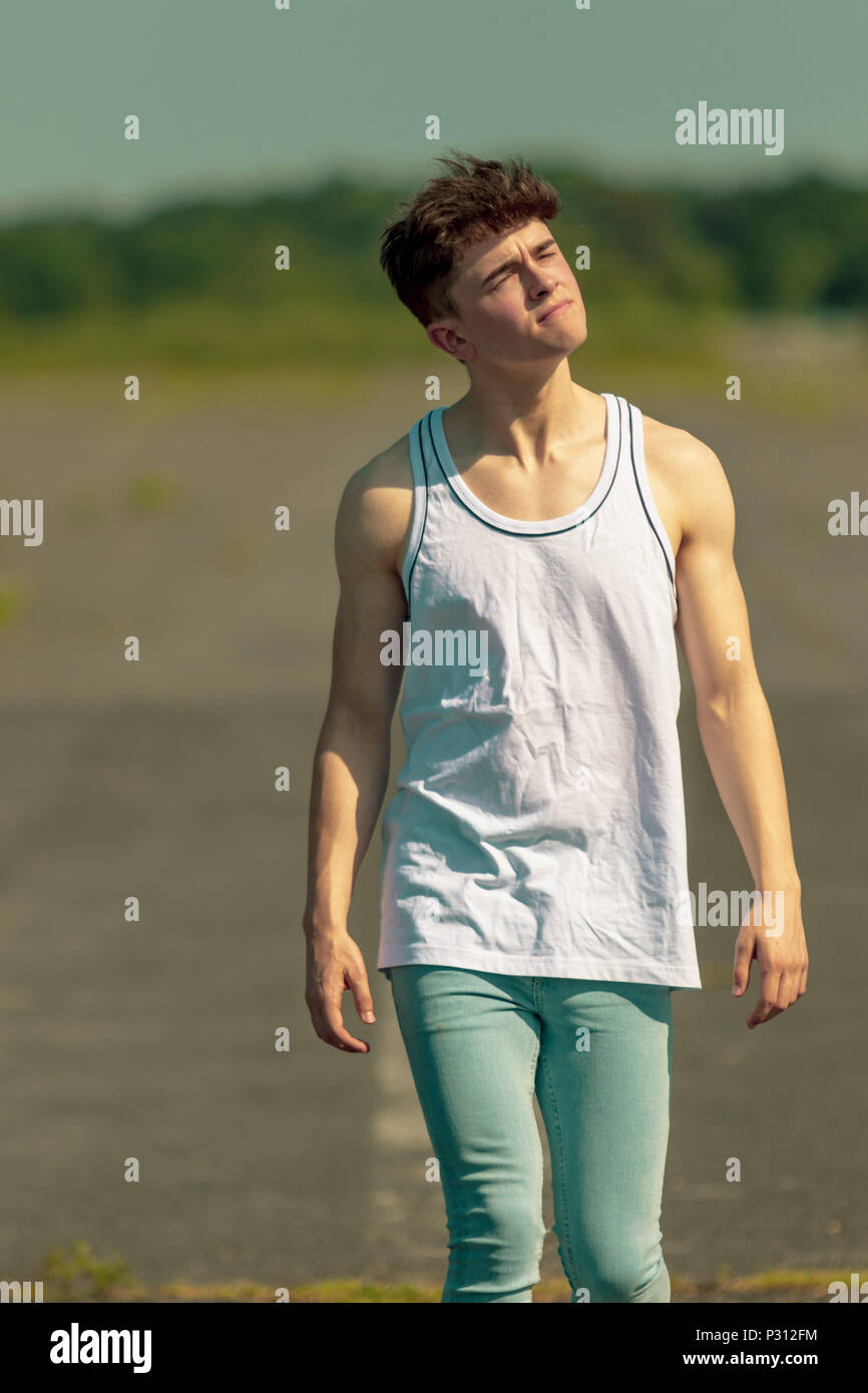 Male high school student walking hi-res stock photography and images ...