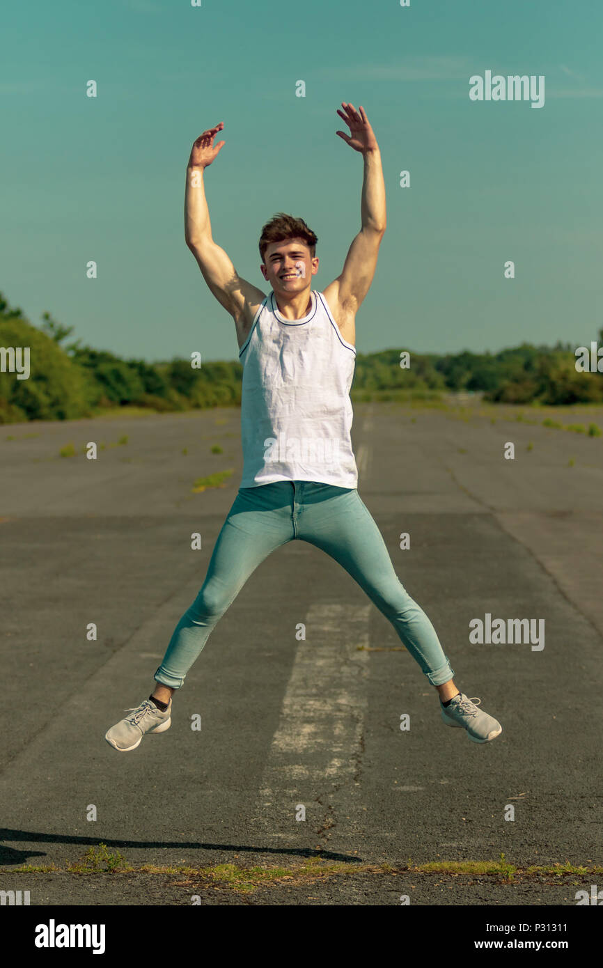 Hot man jumping hi-res stock photography and images - Alamy