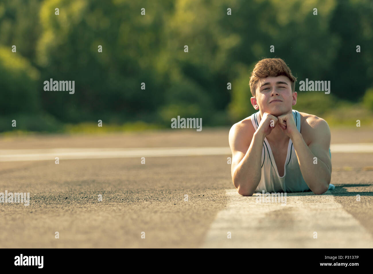 Male model laying down in hi-res stock photography and images - Alamy