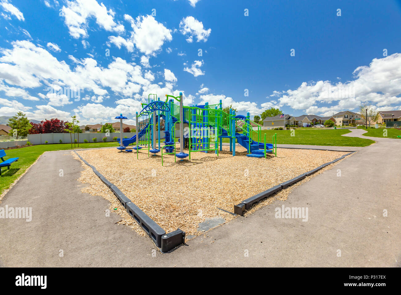 Blue skies above playground in Utah Valley Stock Photo - Alamy