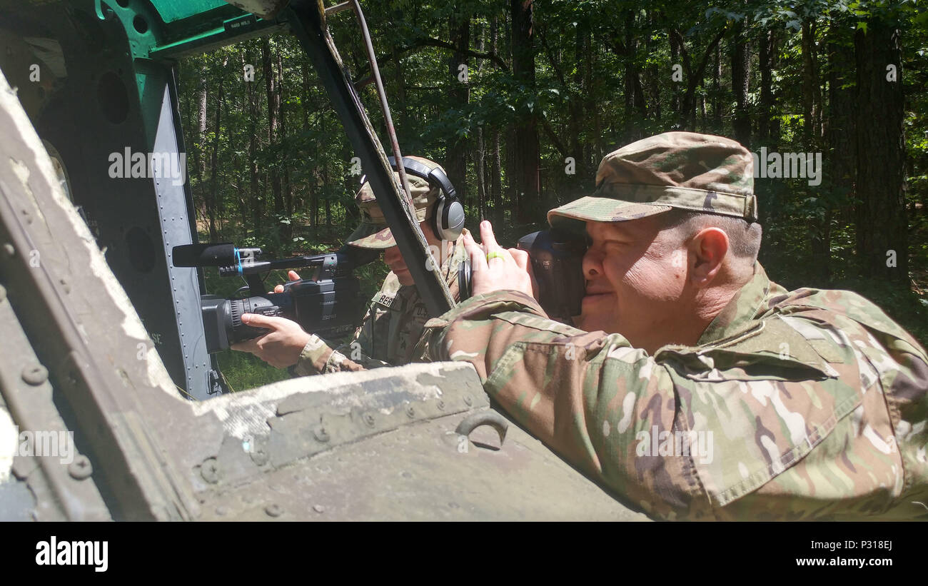 U.S. Army Reserve Sgt. Quentin Johnson, right, a public affairs (print ...
