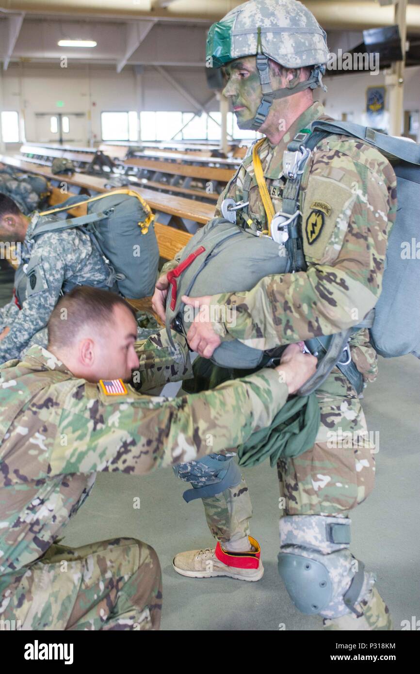 A 725th Brigade Support Battalion paratrooper has his equipment ...