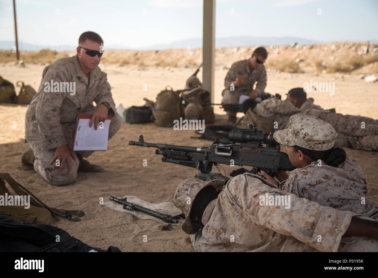 U.S. Marines with Headquarters Battalion, 1st Marine Division, receive ...