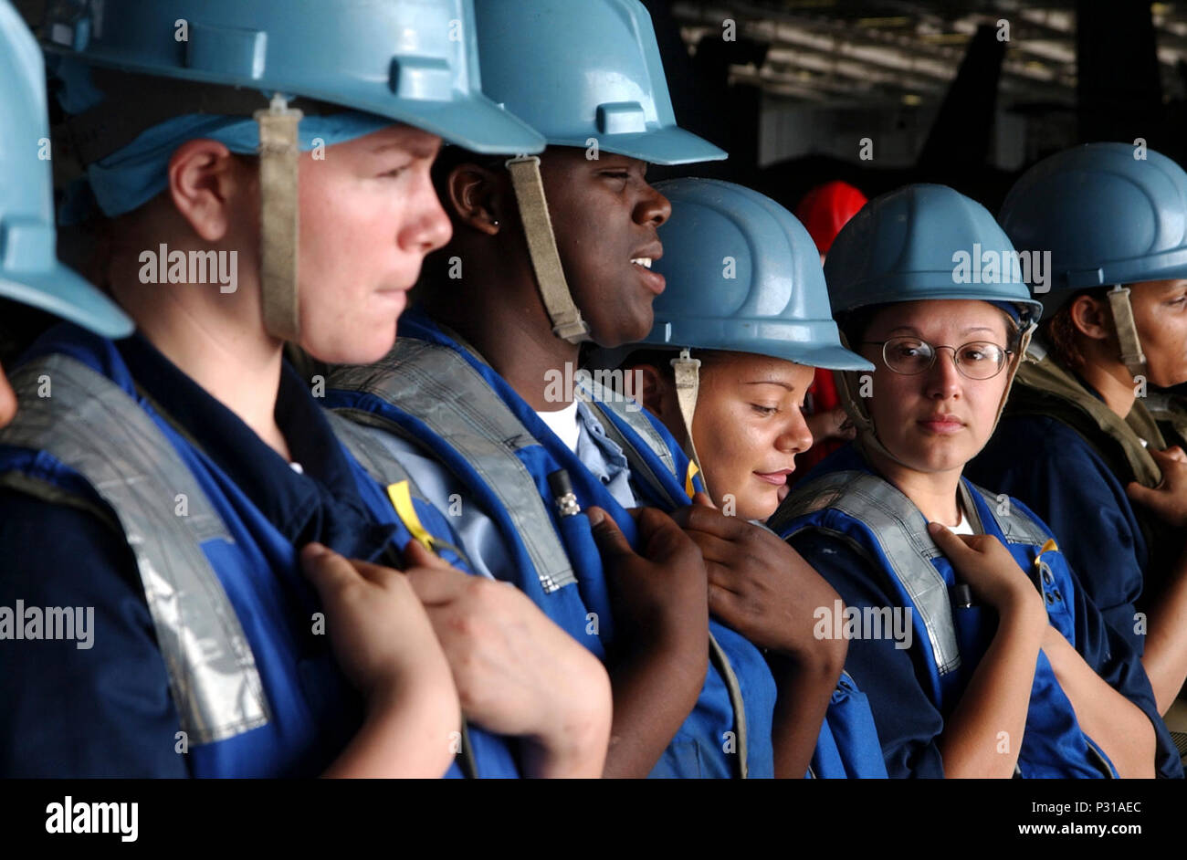 sea aboard USS John C. Stennis (CVN 74) Dec. 17, 2001 -- A team of ...