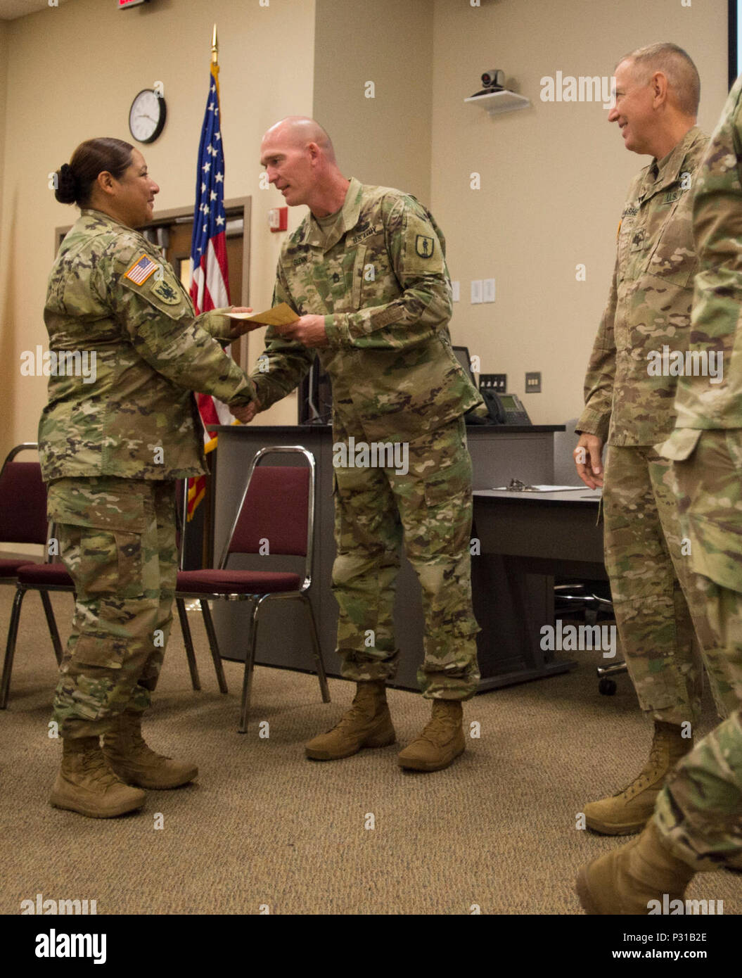 Staff Sgt. Louise Smith of Binger, Oklahoma, receives her cannon ...