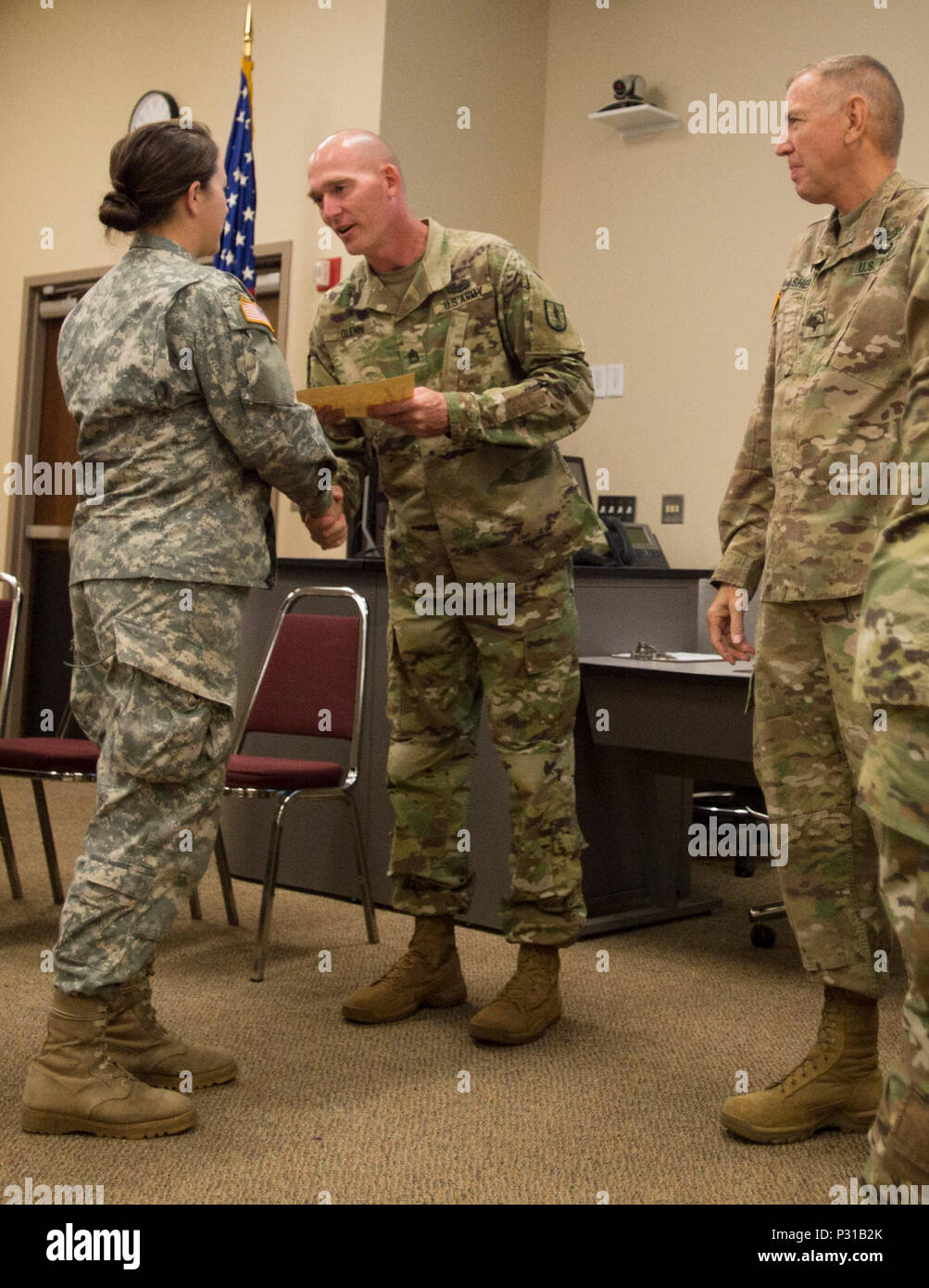 Spc. Lynda Steele of Warr Acres, Oklahoma, receives her cannon ...