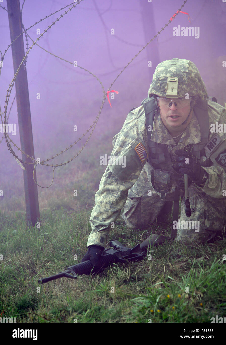 Oregon Army National Guard Sgt. Arom Schultz, with the 1186th Military Police Company, 821st ...