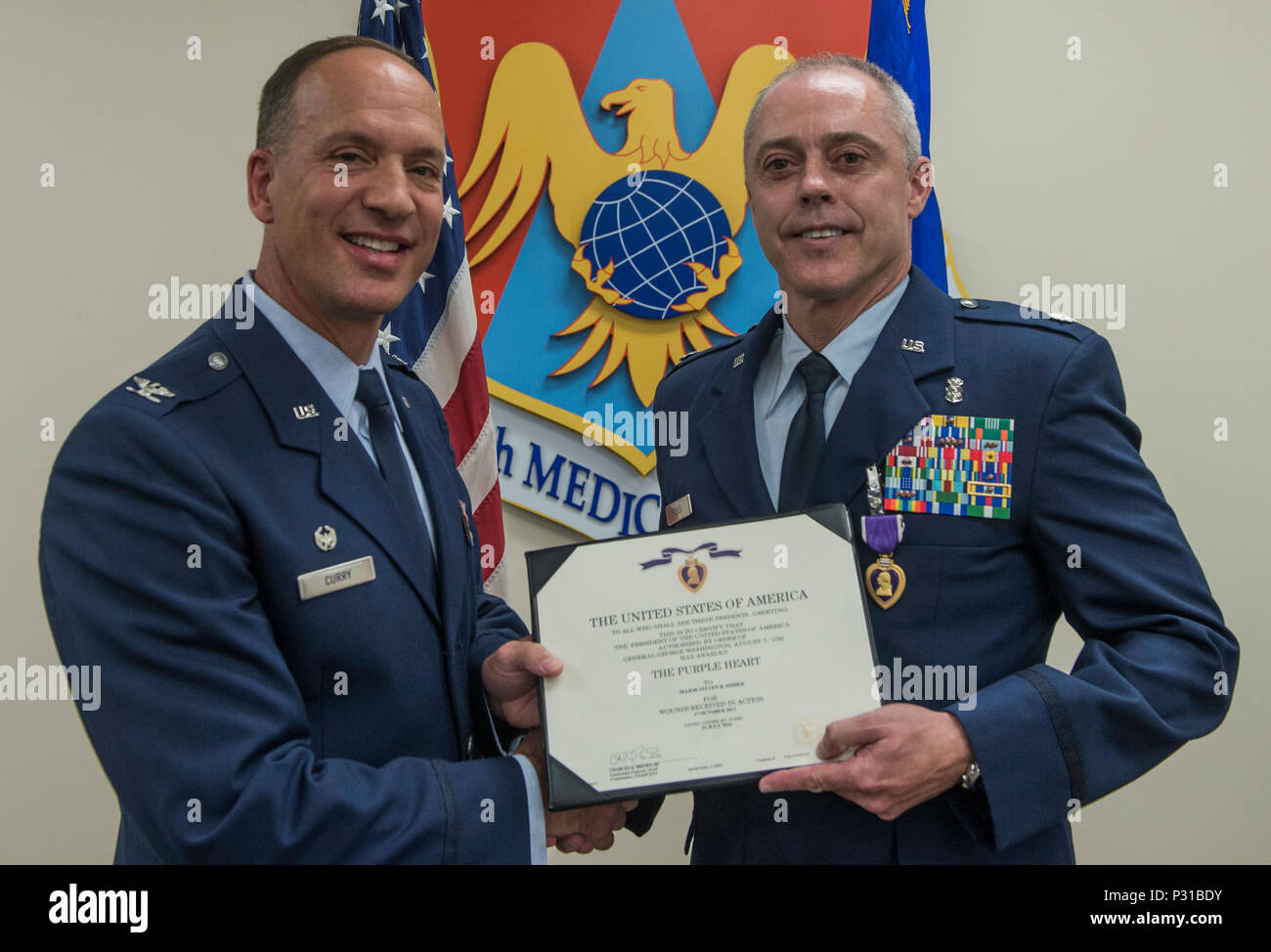 Col. Douglas Curry, 375th Medical Group commander presents Lt. Col ...
