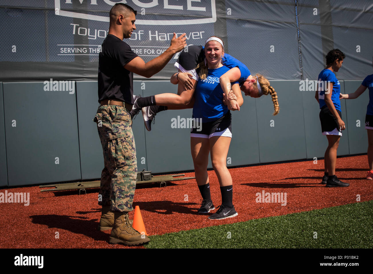 U.S. Marine Corps Gunnery Sgt. Christopher Nieves, staff ...