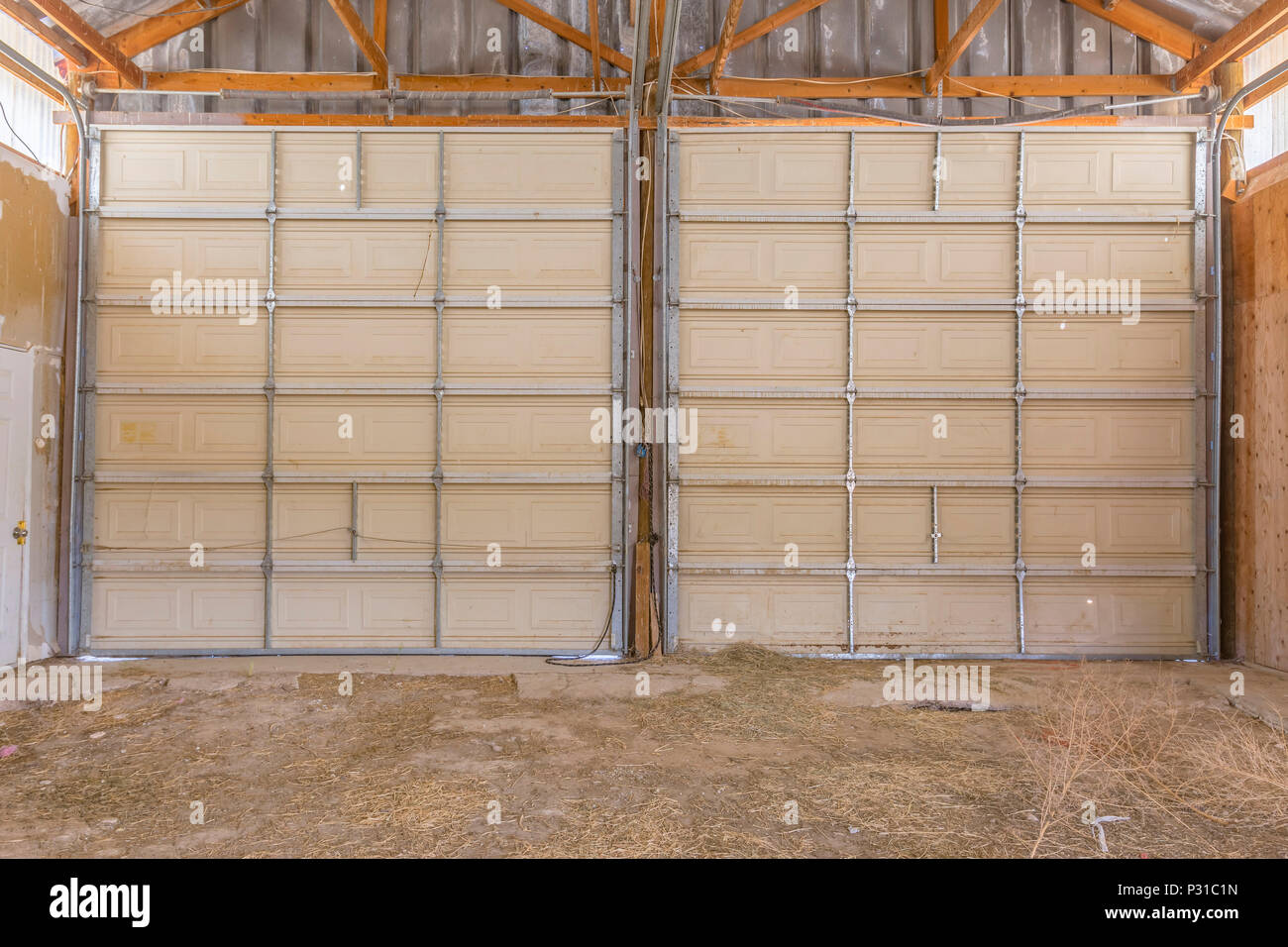 Double doors on large old barn in Utah. Doors opening up for tractors ...