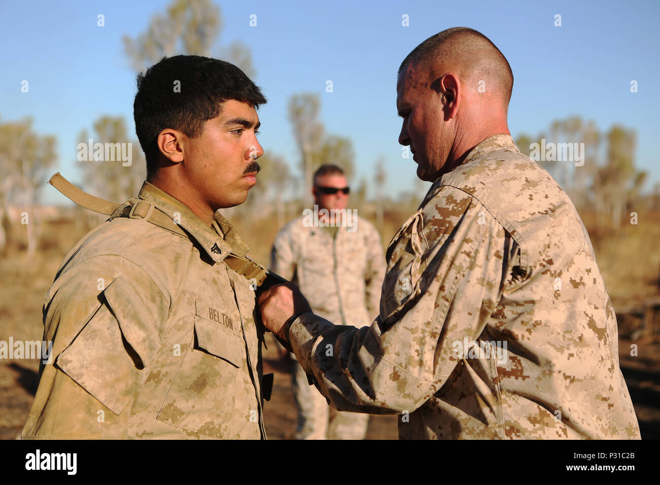 Colonel Kevin Norton, commanding officer of 4th Marine Regiment, awards ...