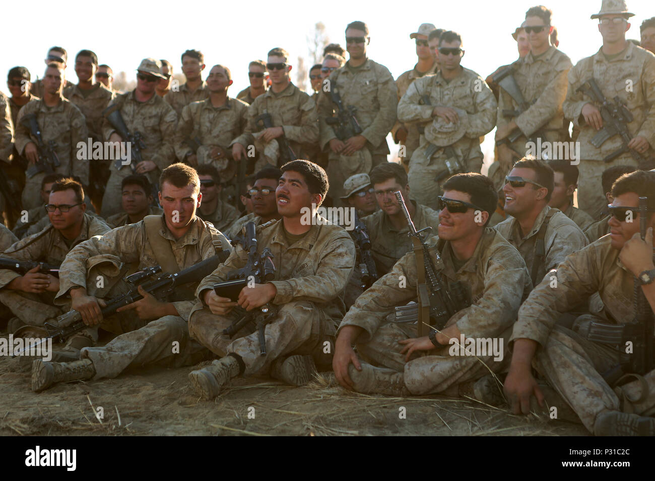 Cpl. Ryker Belton (center), a Marine with 1st Battalion, 1st Marine ...