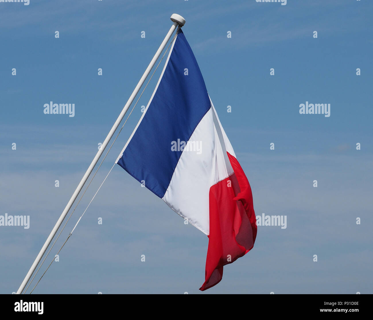 the French national flag of France, Europe over blue sky Stock Photo ...