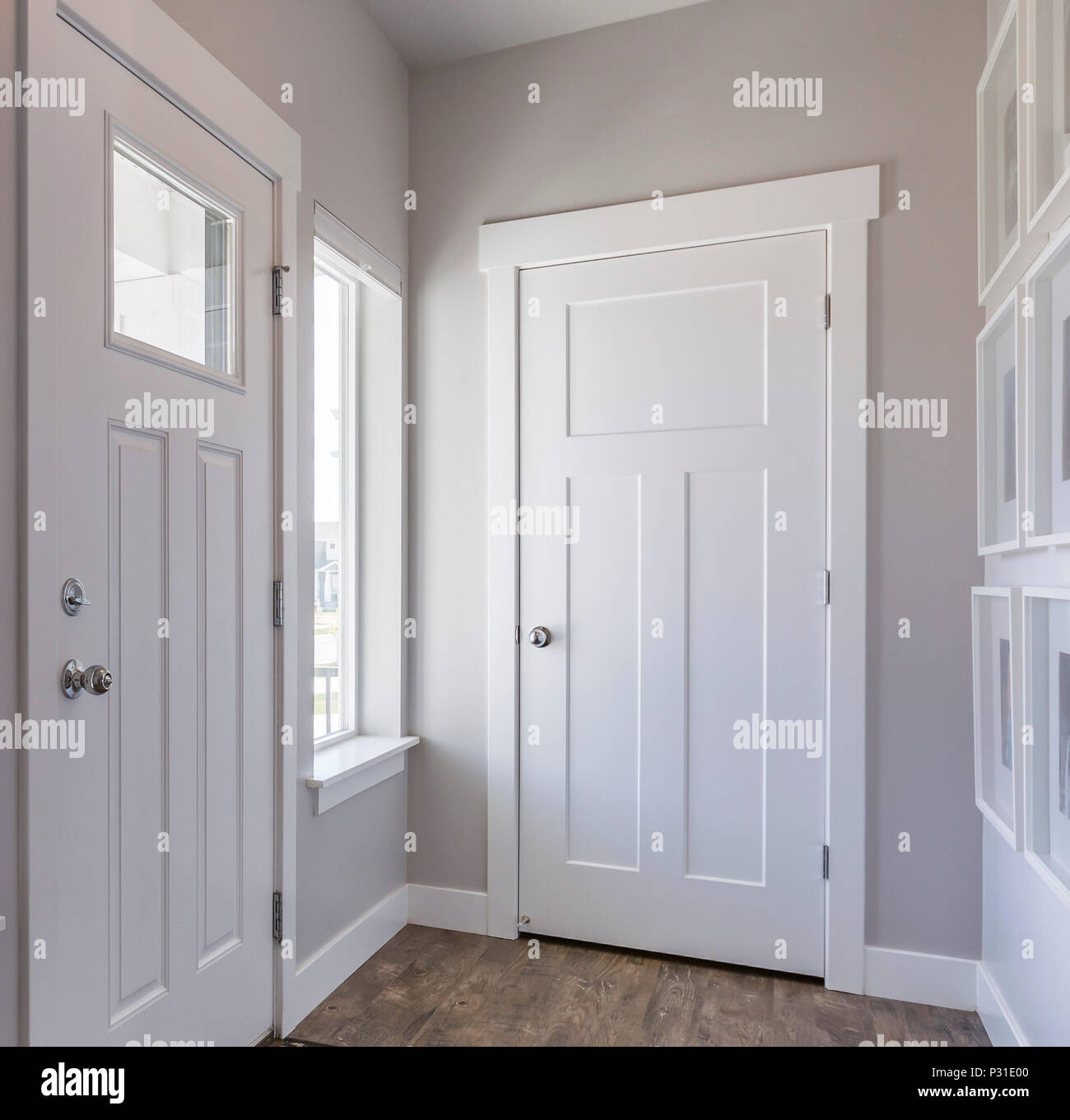 Entry way of clean modern home pure white Stock Photo - Alamy