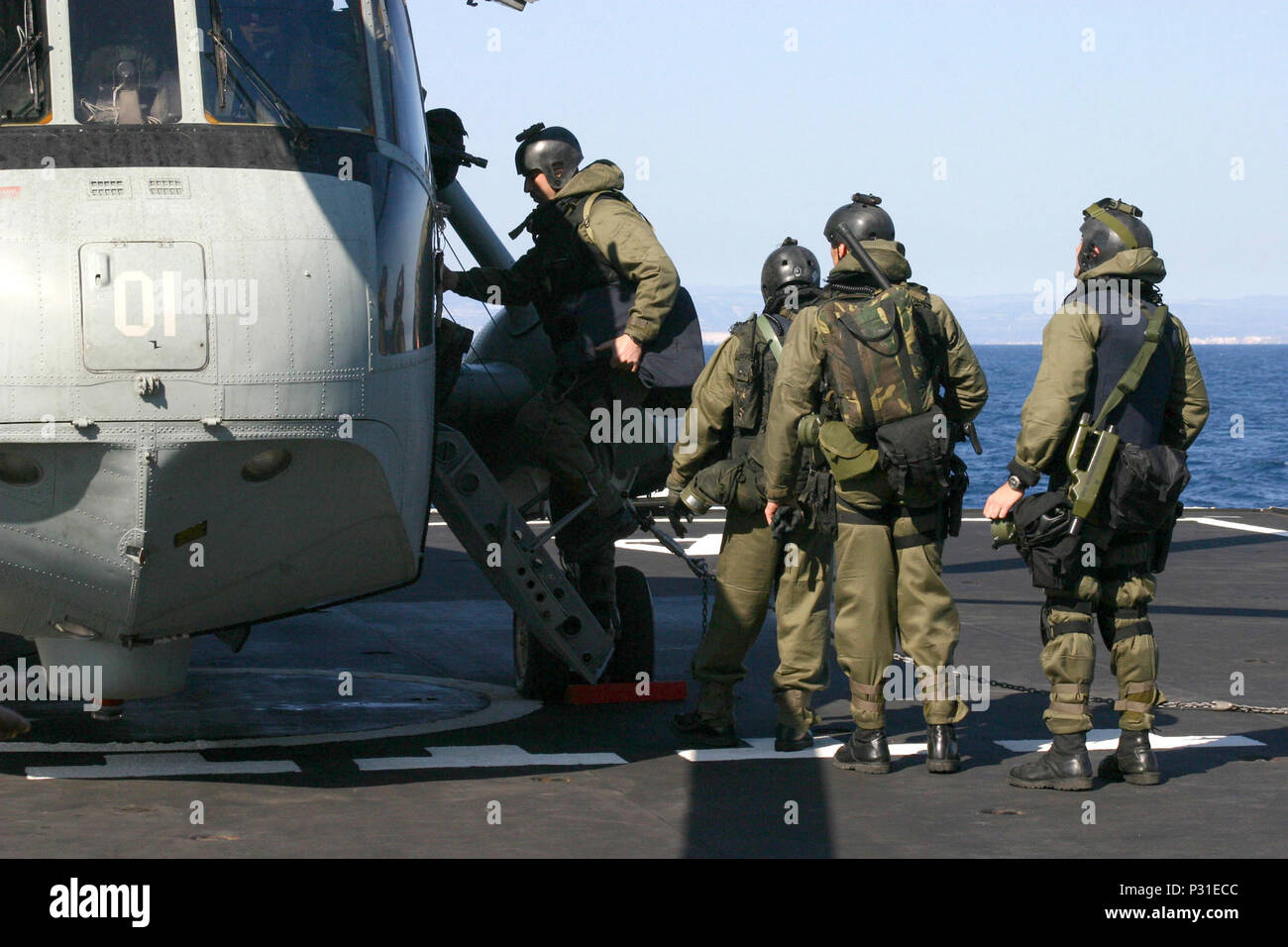 Bay, Sicily (Apr. 22, 2004) - Italian Special Forces personnel board an ...