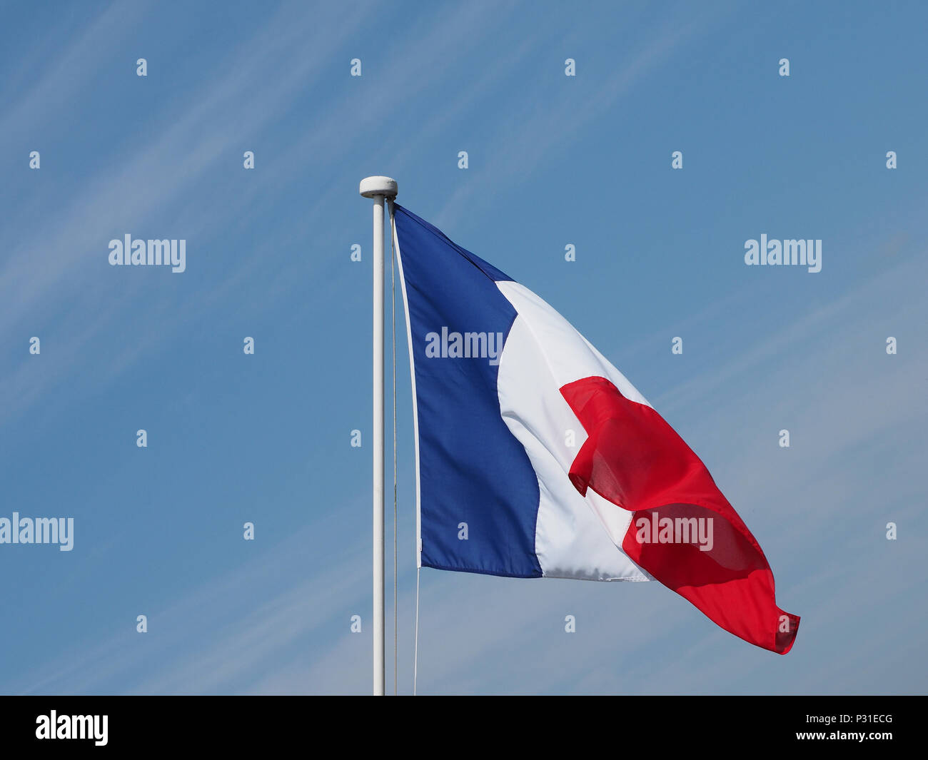 the French national flag of France, Europe over blue sky Stock Photo ...