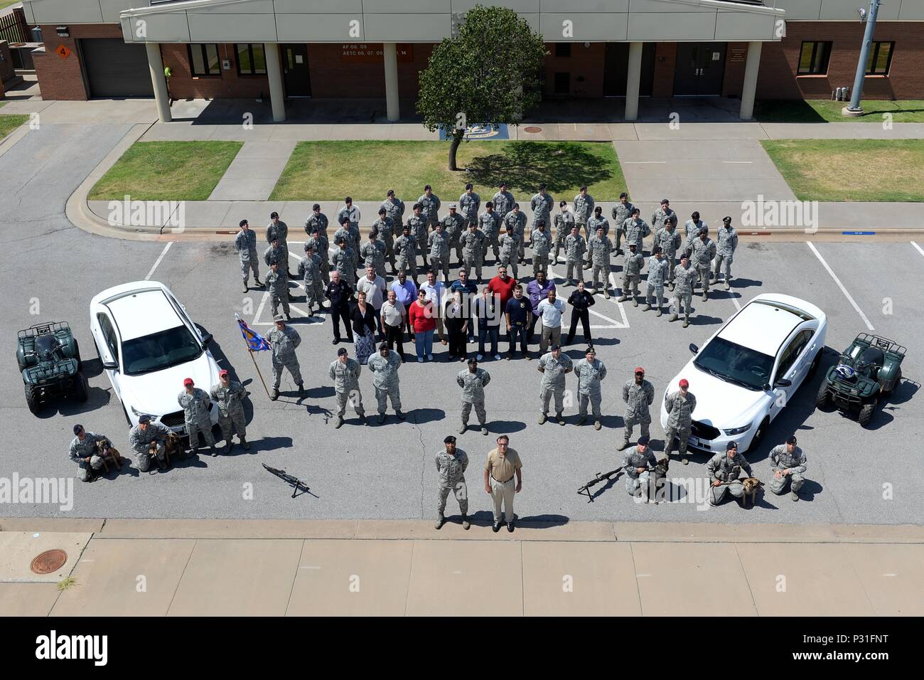 Airmen from the 82nd Security Forces Squadron pose for a group photo at ...